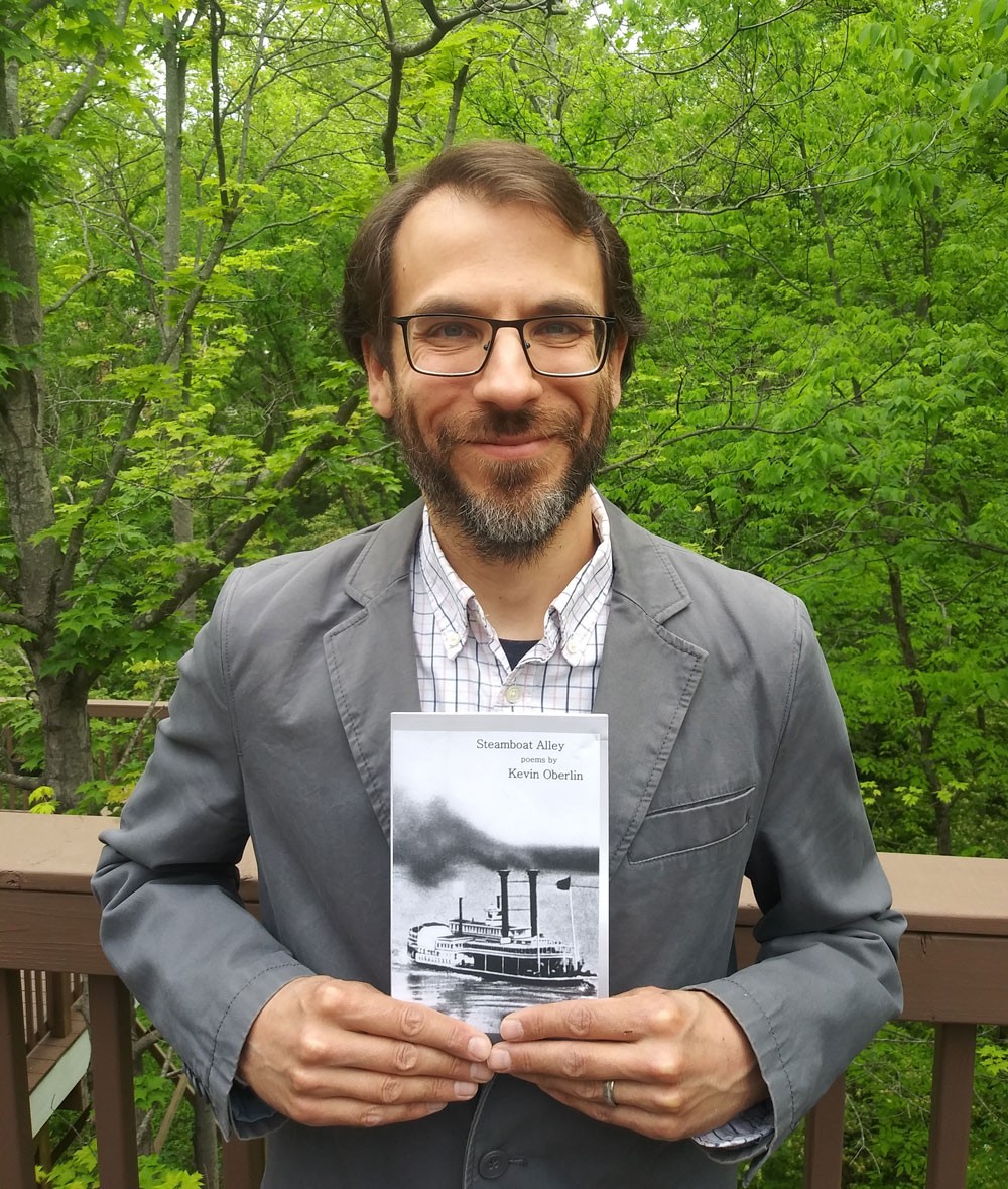 UC Blue Ash professor reflects on parenthood in award-winning poetry ...